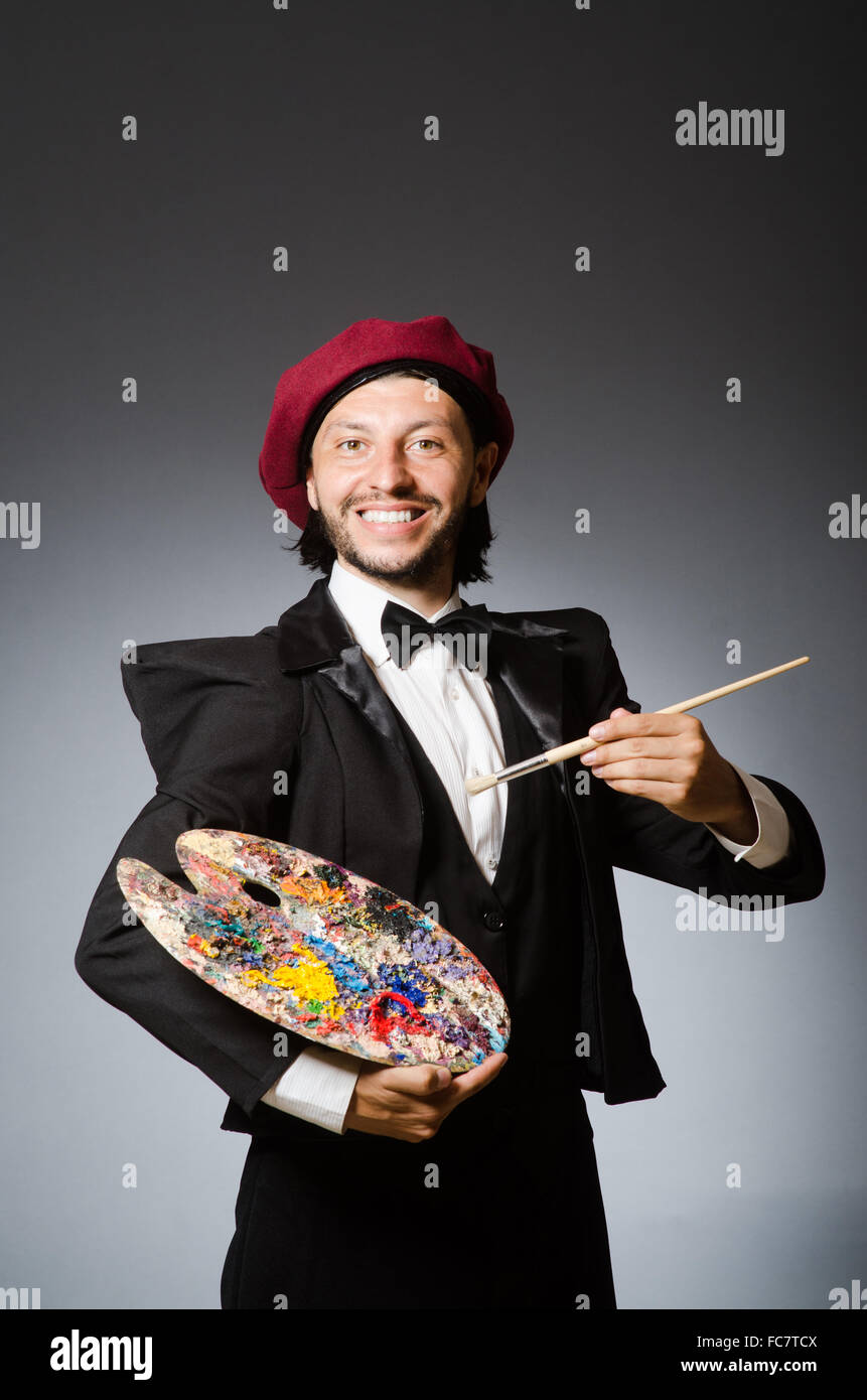 Funny artist working in the studio Stock Photo - Alamy
