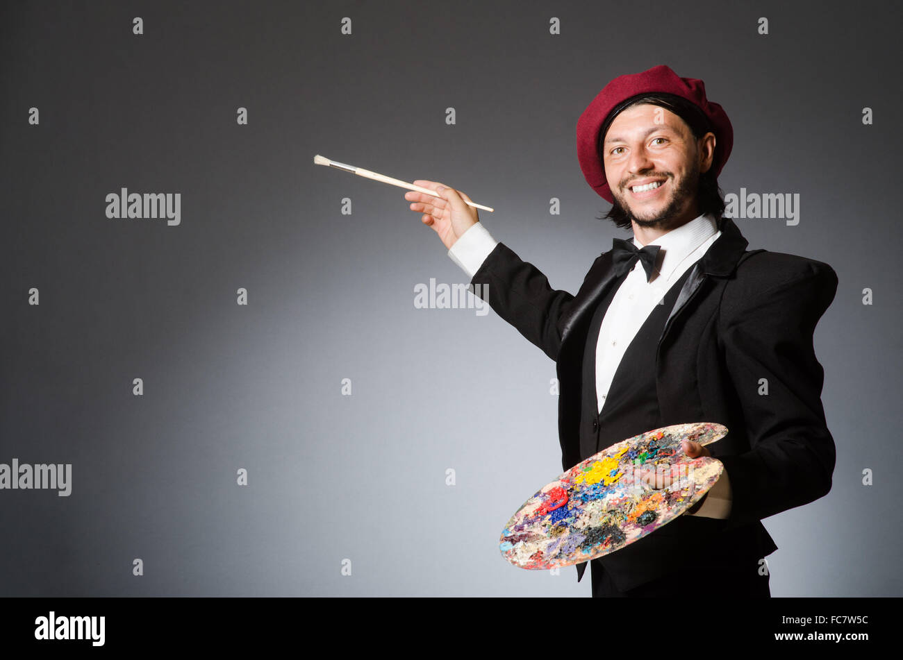 Funny artist working in the studio Stock Photo - Alamy