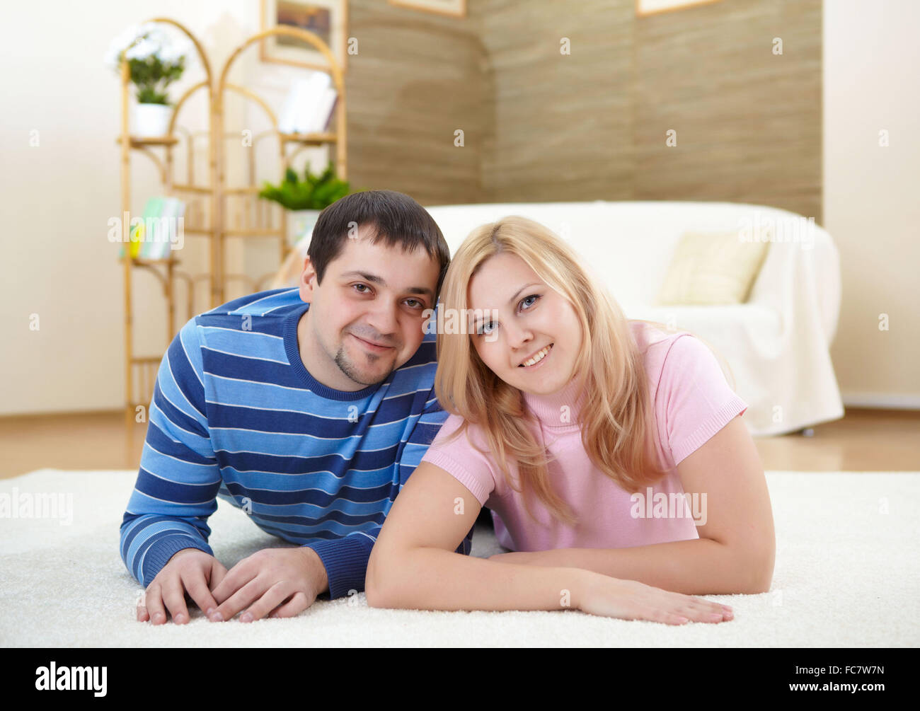 a happy young couple in love spending time together Stock Photo - Alamy