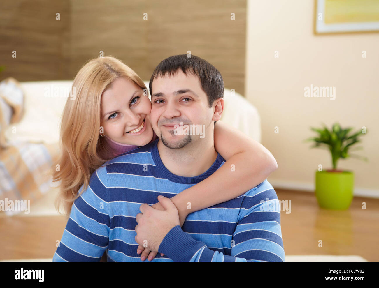 a happy young couple in love spending time together Stock Photo - Alamy