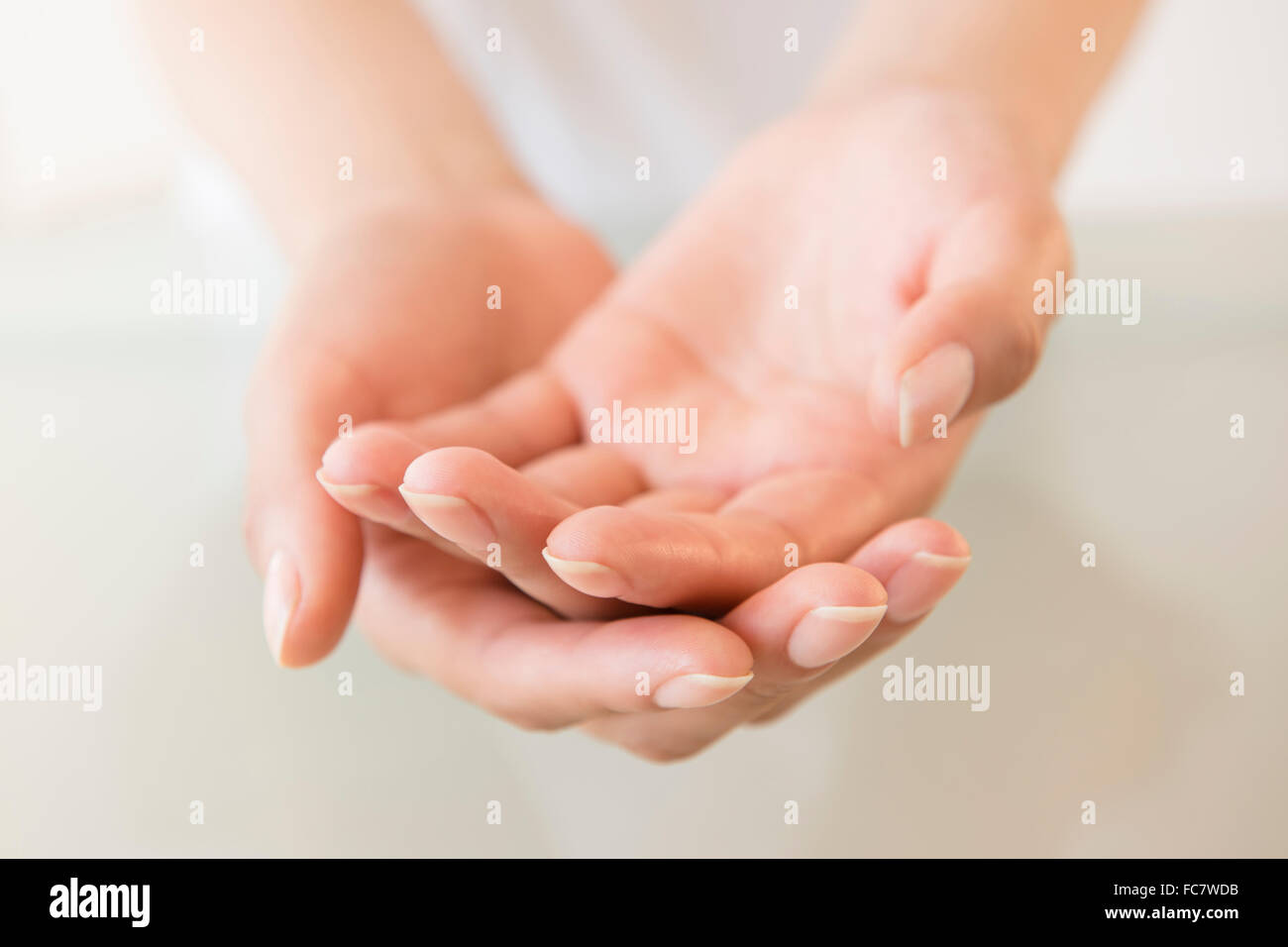 Cupped hands hi-res stock photography and images - Alamy