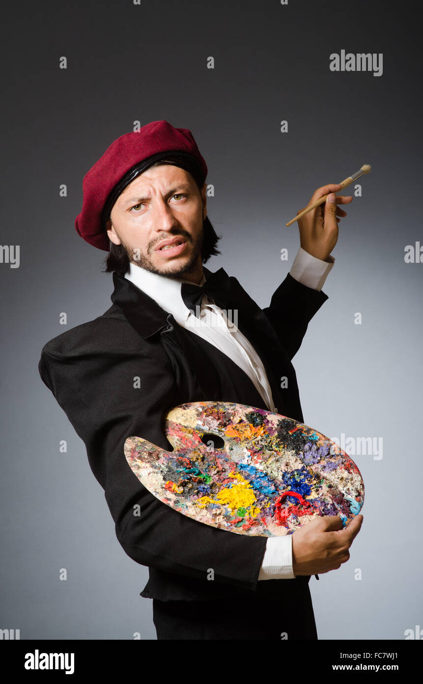 Funny artist working in the studio Stock Photo - Alamy