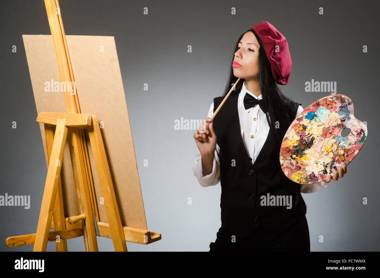 Funny artist working in the studio Stock Photo - Alamy