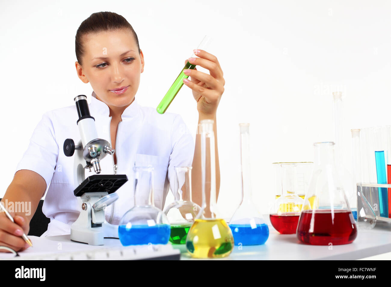 Young female scientist in a chemistry laboratory Stock Photo - Alamy