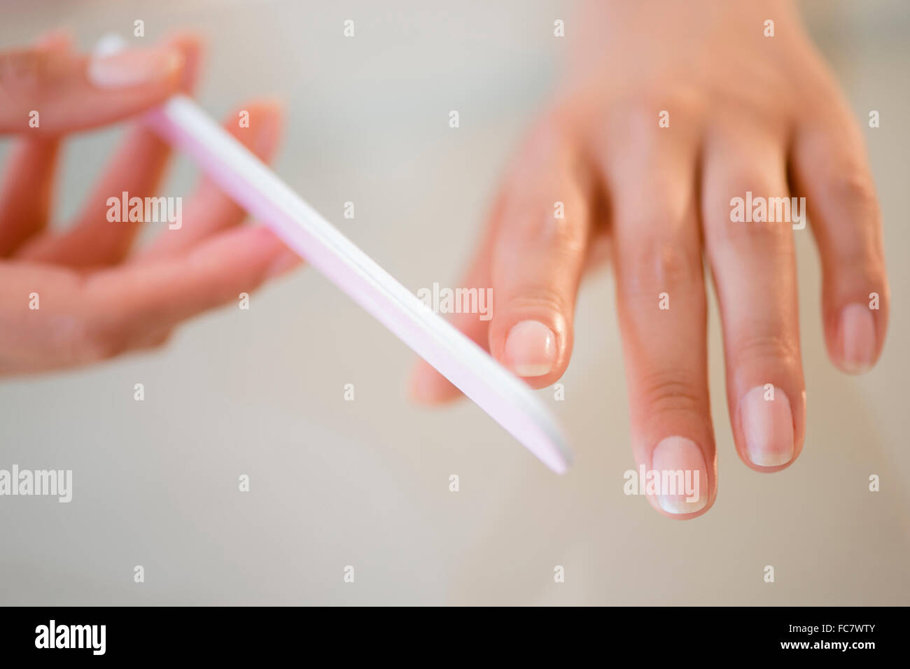 Woman nail filing hi-res stock photography and images - Alamy