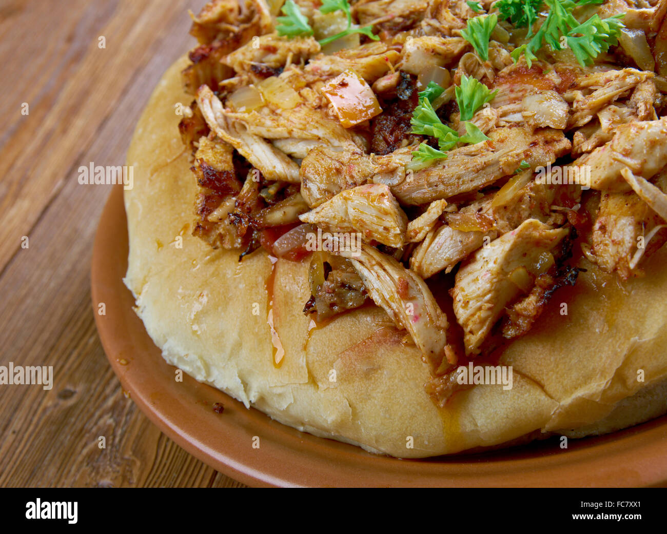 Musakhan Baked Chicken Over Bread Stock Photo - Alamy
