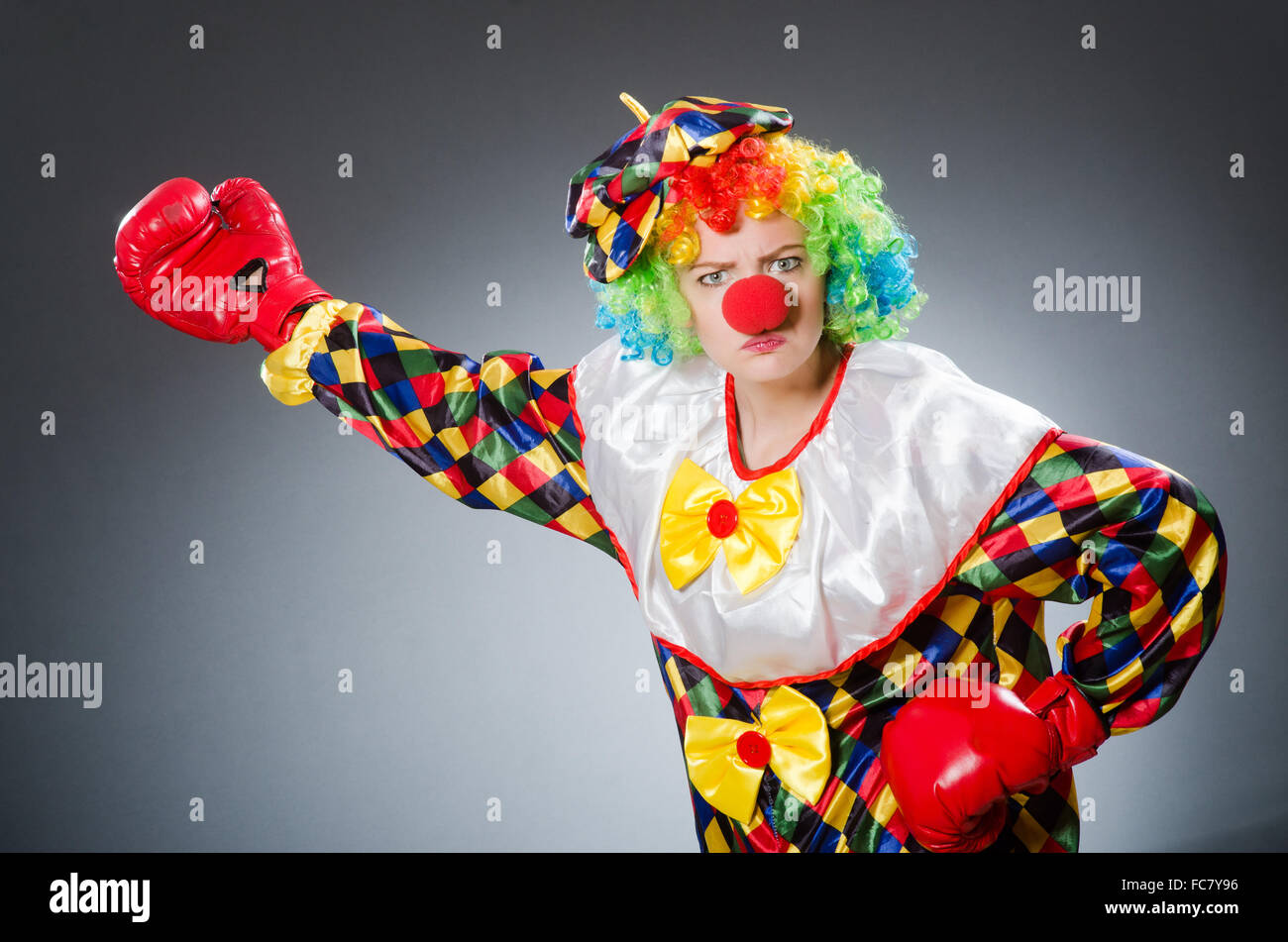 Funny clown with boxing gloves Stock Photo - Alamy