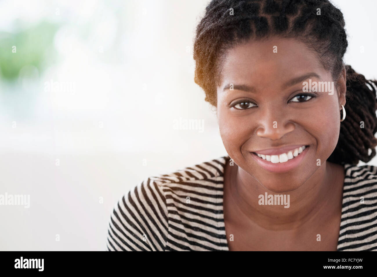 Black woman smiling Stock Photo - Alamy