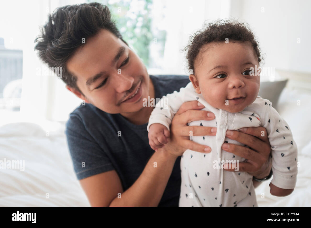African father son on shoulders hi-res stock photography and images - Alamy