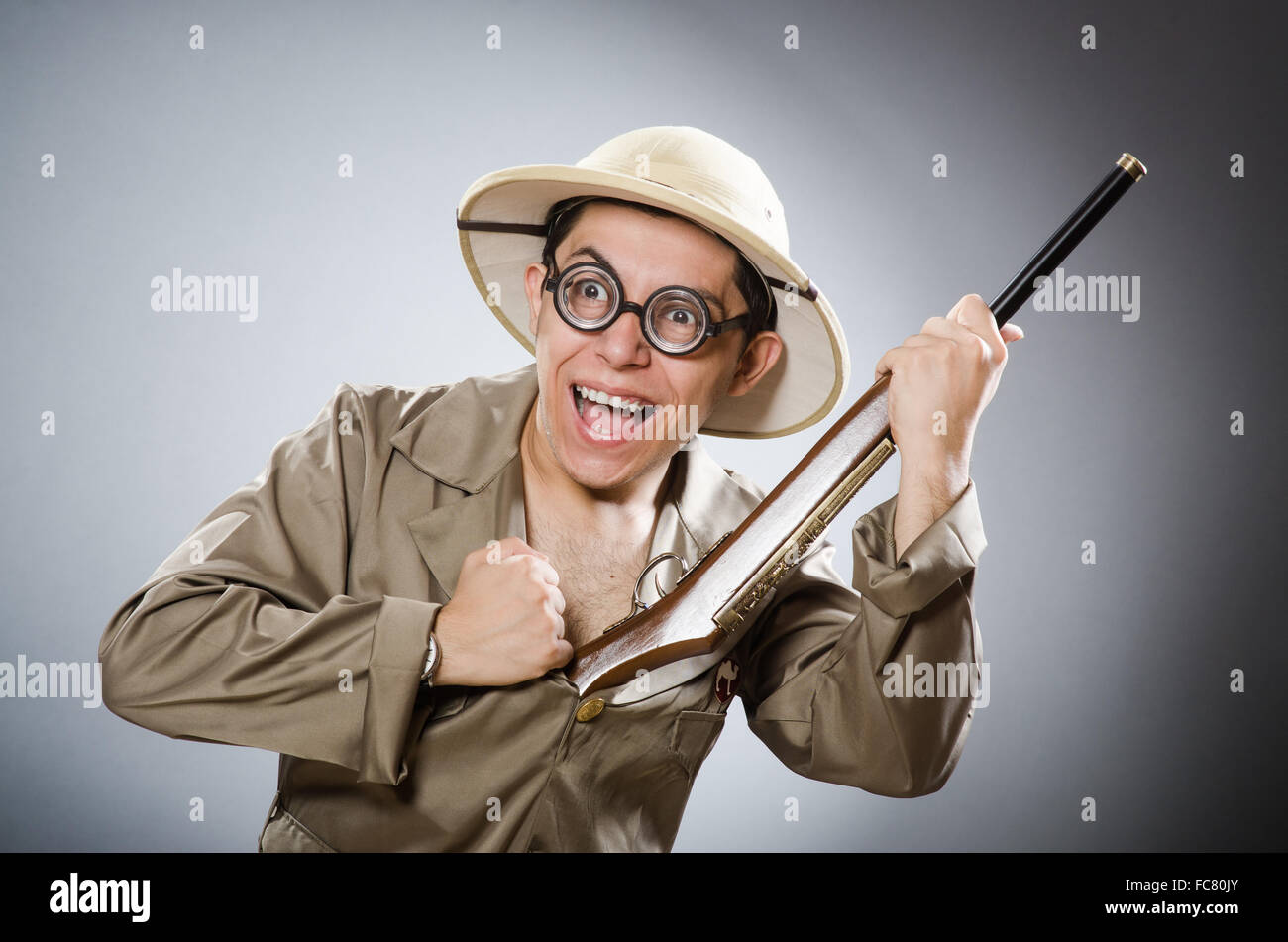 Funny hunter in hunting concept Stock Photo - Alamy