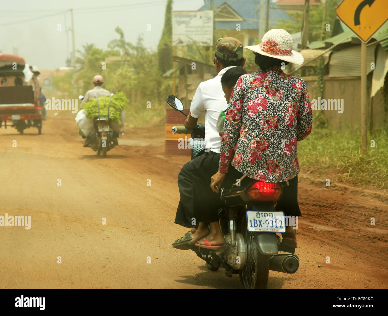 Family on a motorcycle Stock Photo - Alamy