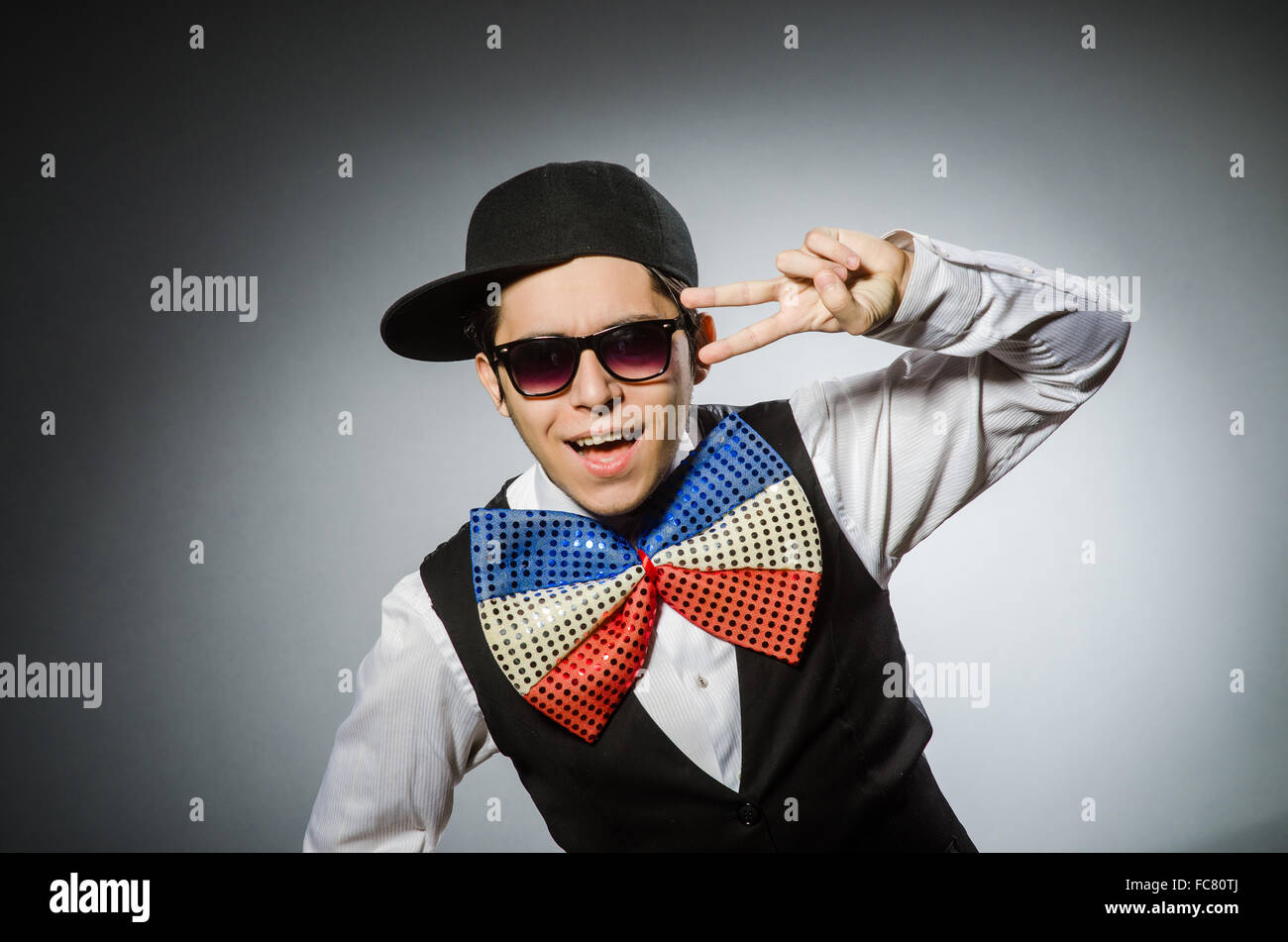 Funny man with giant bow tie Stock Photo - Alamy
