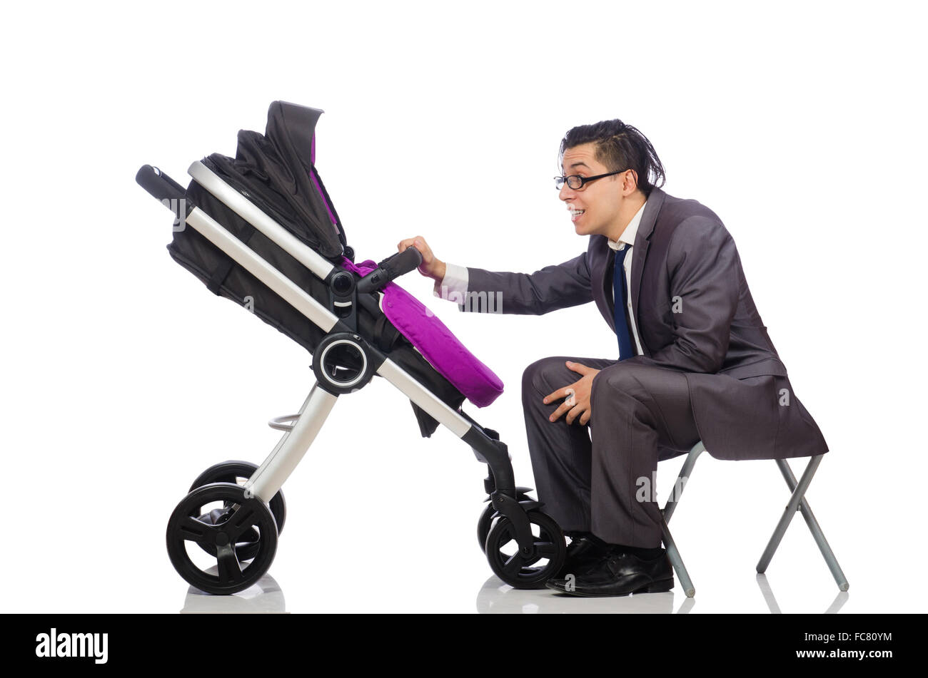 Funny dad with baby and pram on white Stock Photo - Alamy