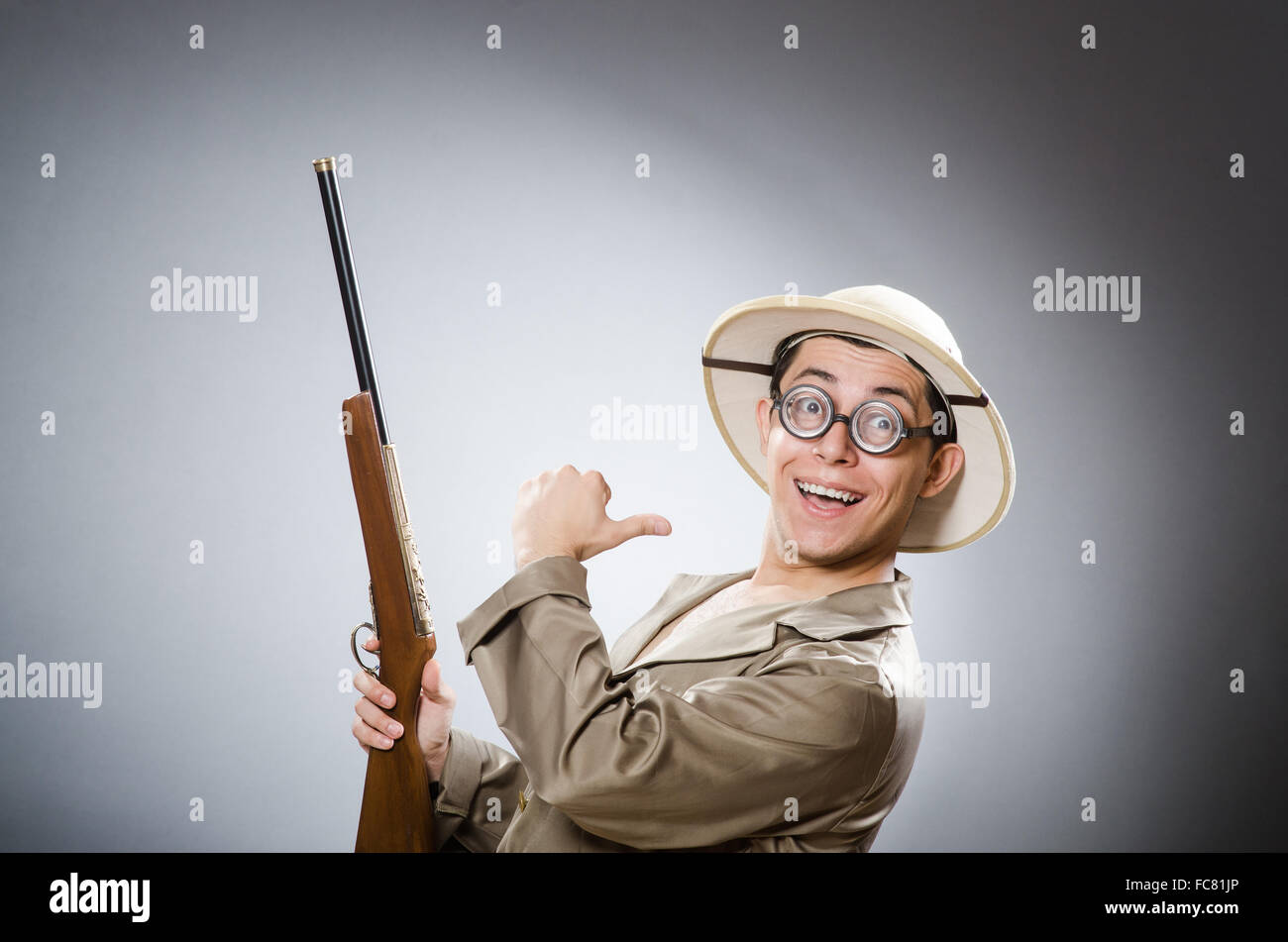 Funny hunter in hunting concept Stock Photo - Alamy