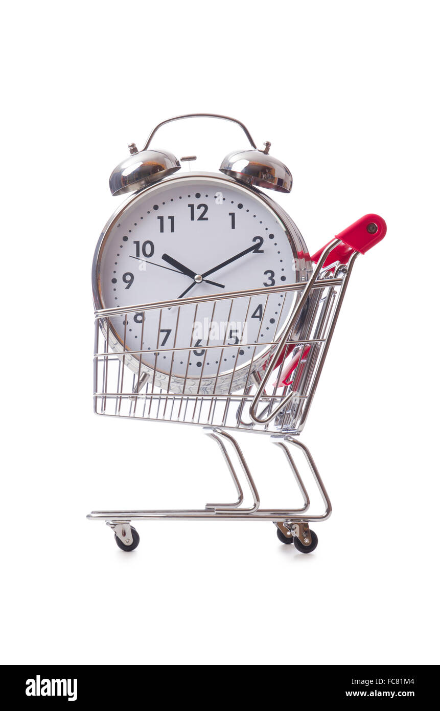 Big alarm clock in shopping cart on white Stock Photo - Alamy
