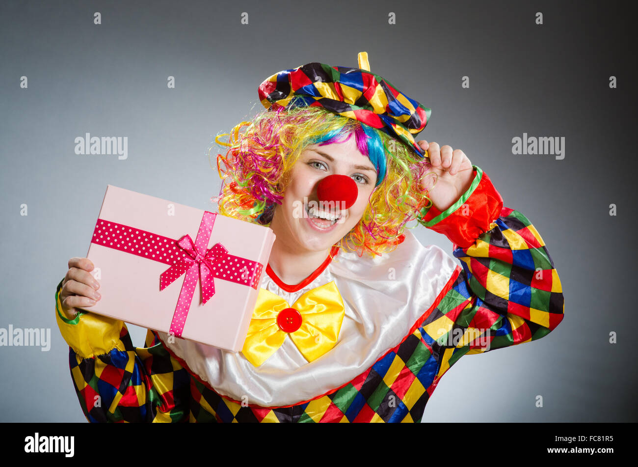 Funny clown in comical concept Stock Photo - Alamy