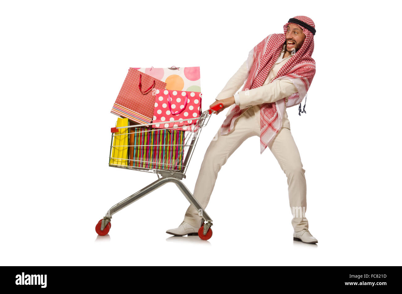 Arab man doing shopping isolated on white Stock Photo - Alamy
