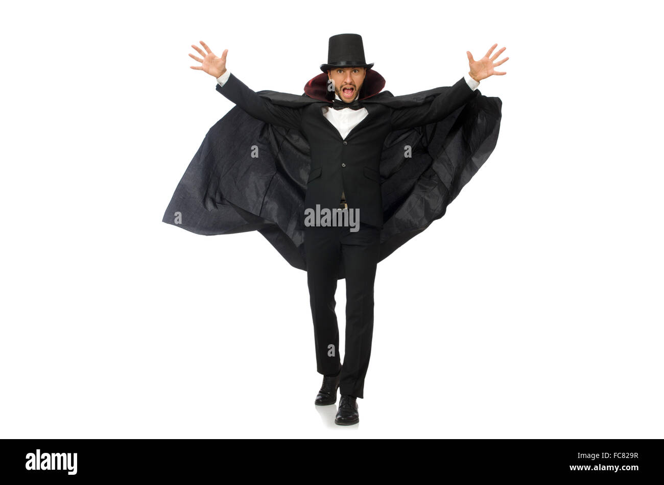 Man magician isolated on white Stock Photo - Alamy