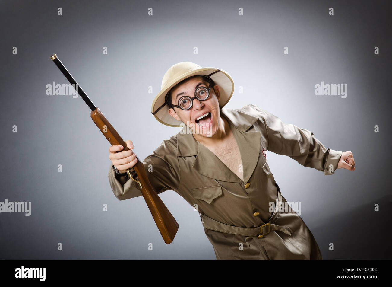 Funny hunter in hunting concept Stock Photo - Alamy