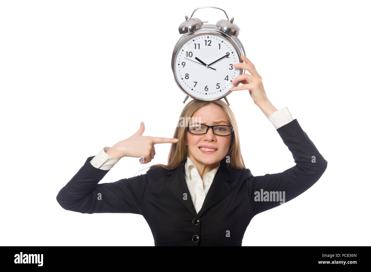Pretty office employee with alarm clock isolated on white Stock Photo ...