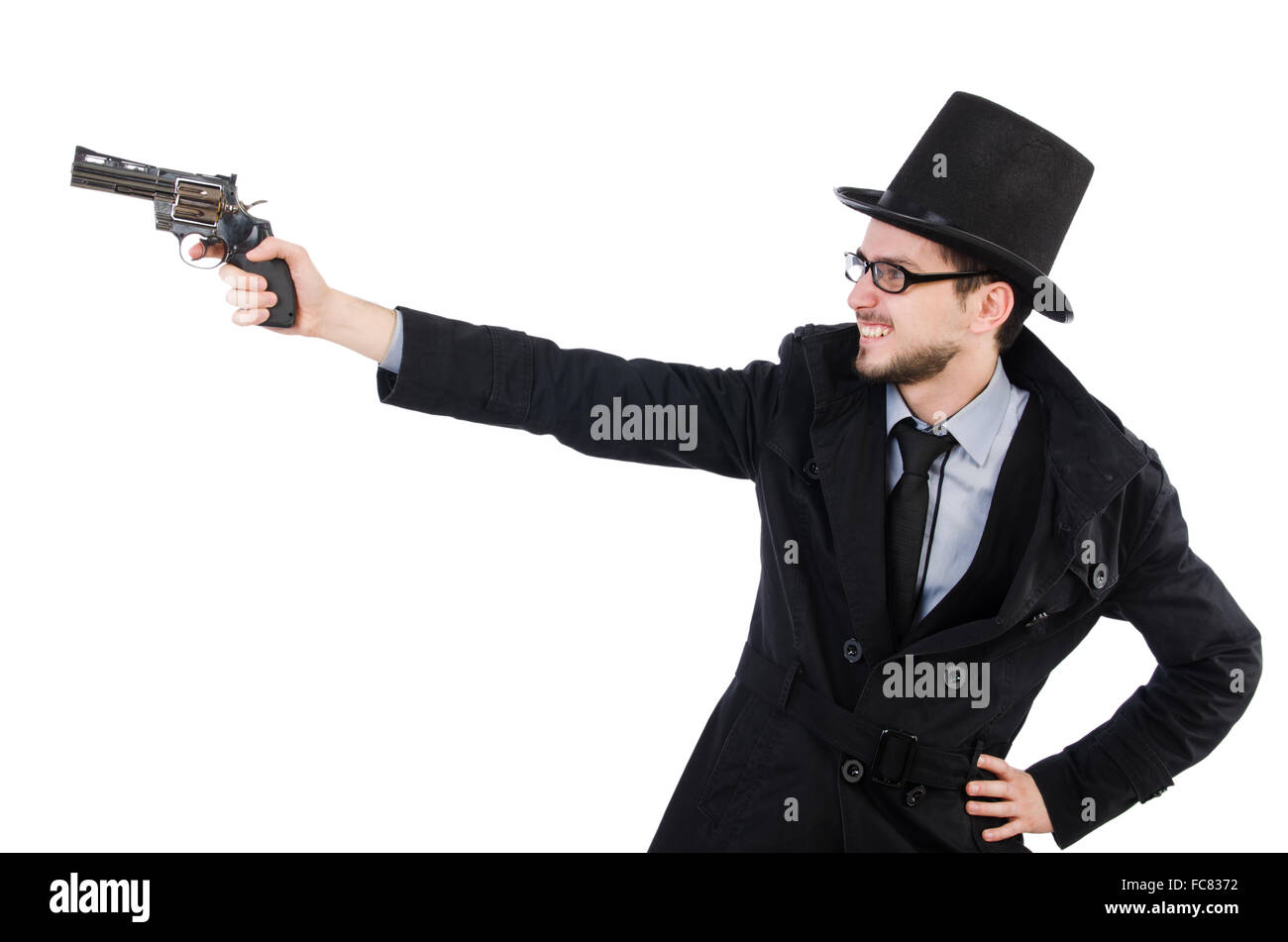 Young detective in black coat holding handgun isolated on white Stock ...