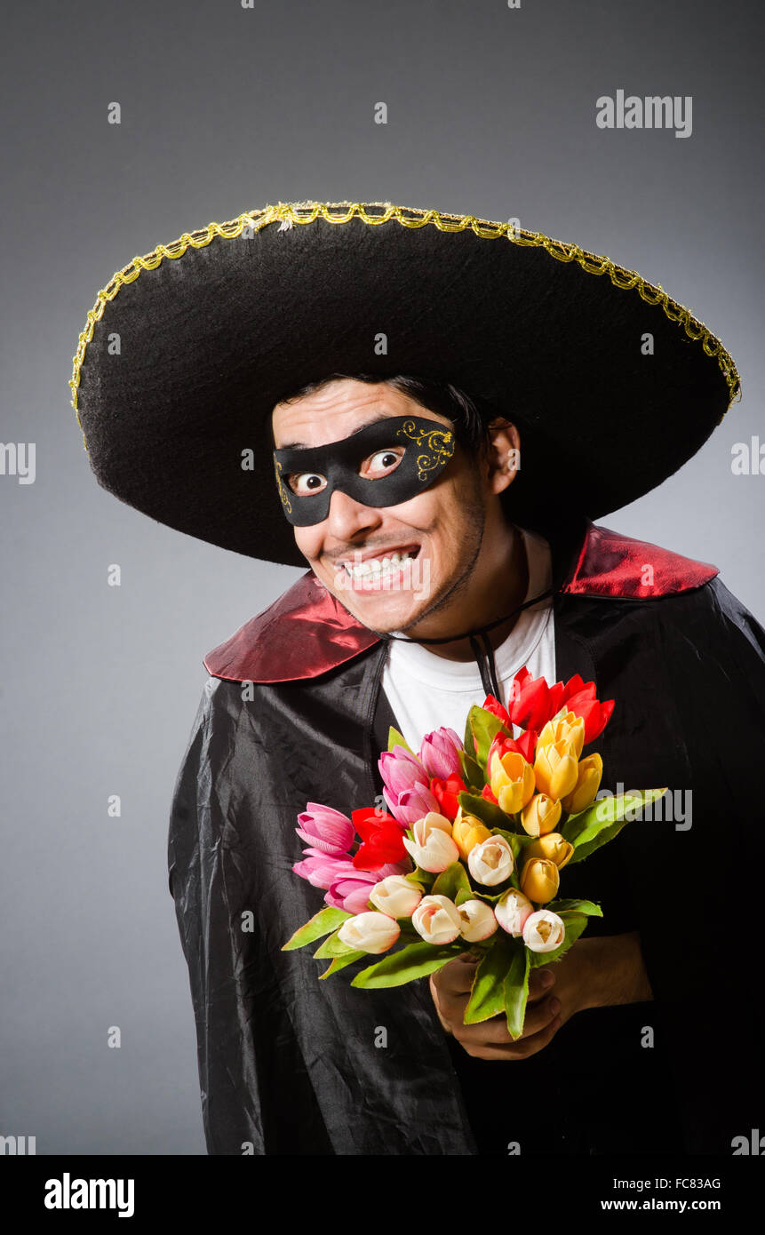 Person wearing sombrero hat in funny concept Stock Photo - Alamy