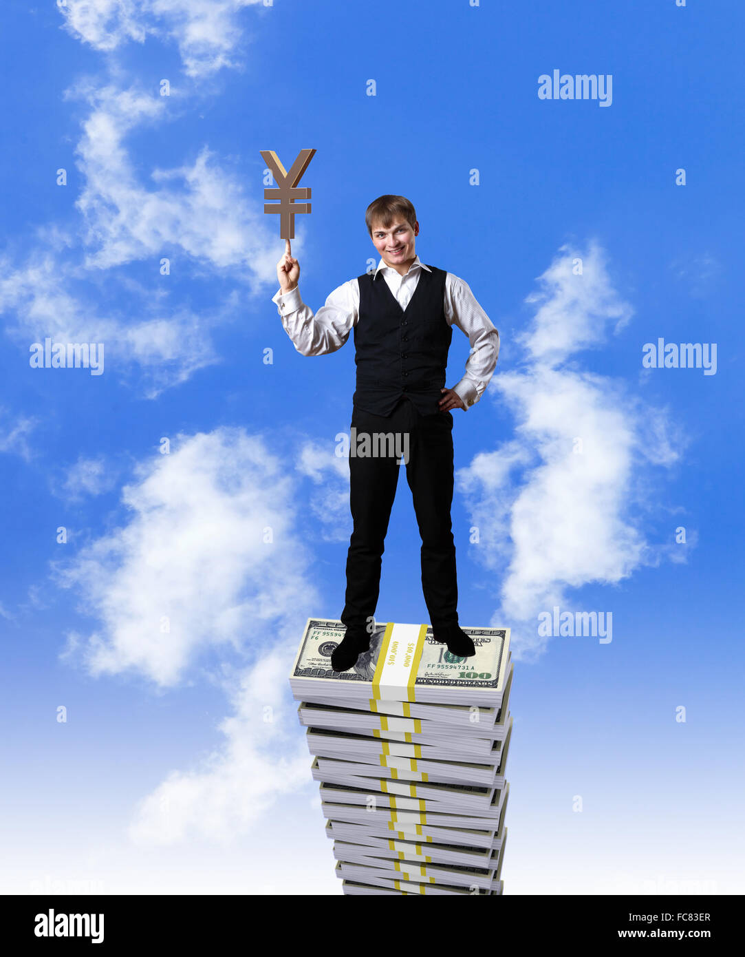 Young businessman with money symbols against blue skyy background Stock ...