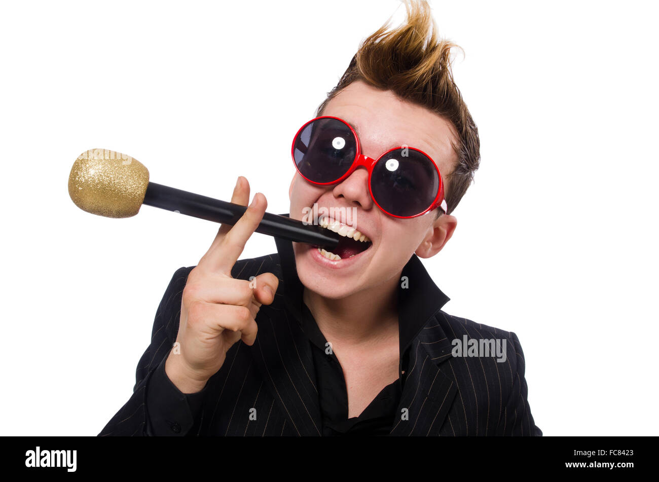Singing man in karaoke concept Stock Photo - Alamy