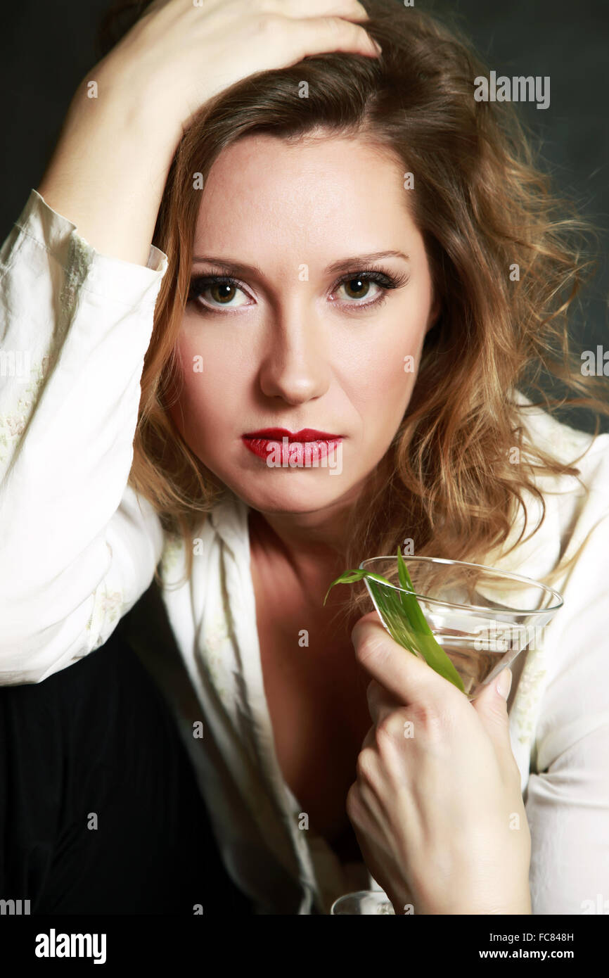 Woman drinking martini hi-res stock photography and images - Alamy