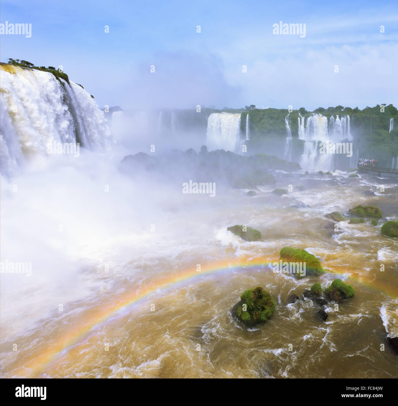 Magnificent rainbow bent in mist Stock Photo - Alamy