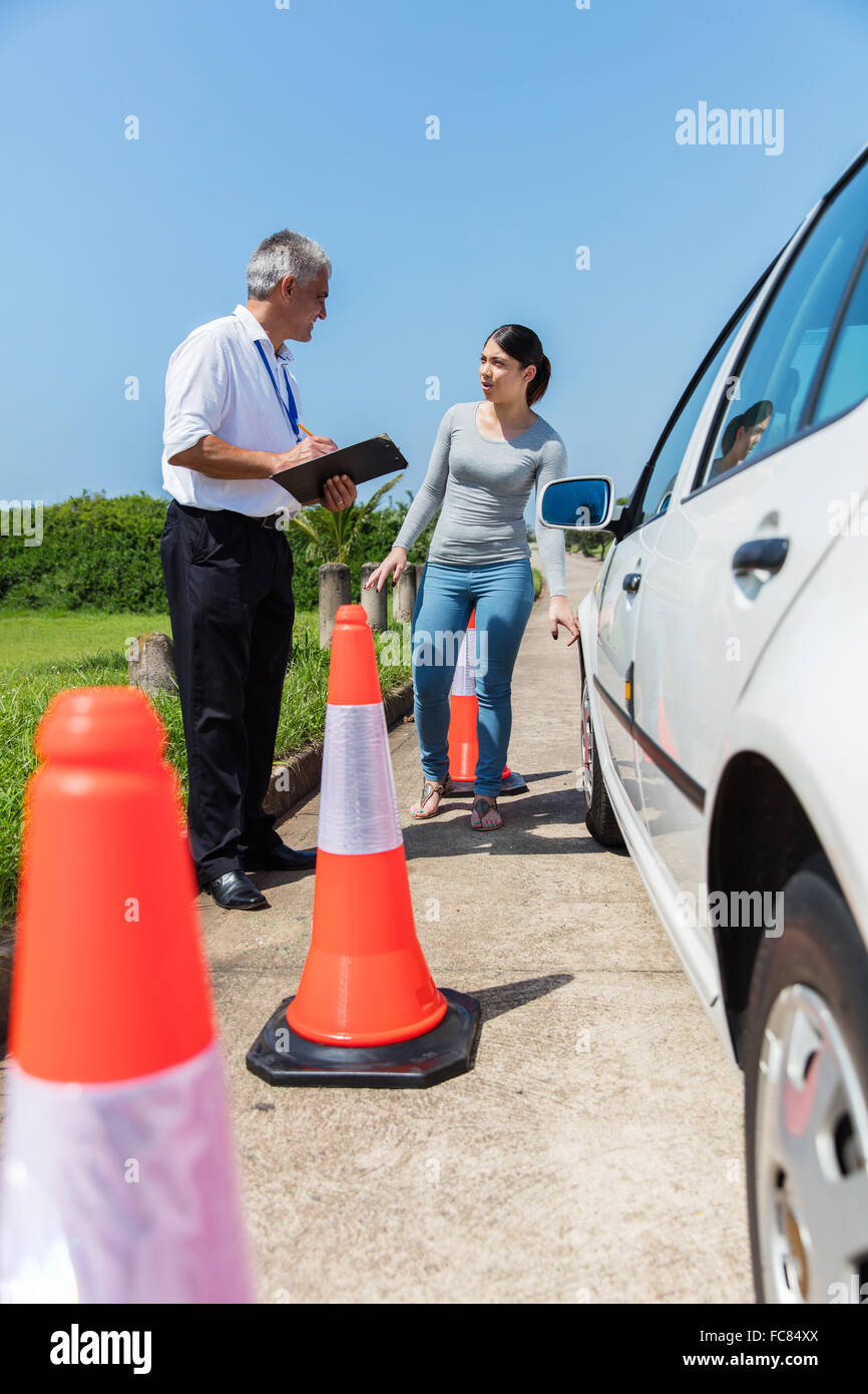 young student driver and instructor doing pre test inspection Stock ...