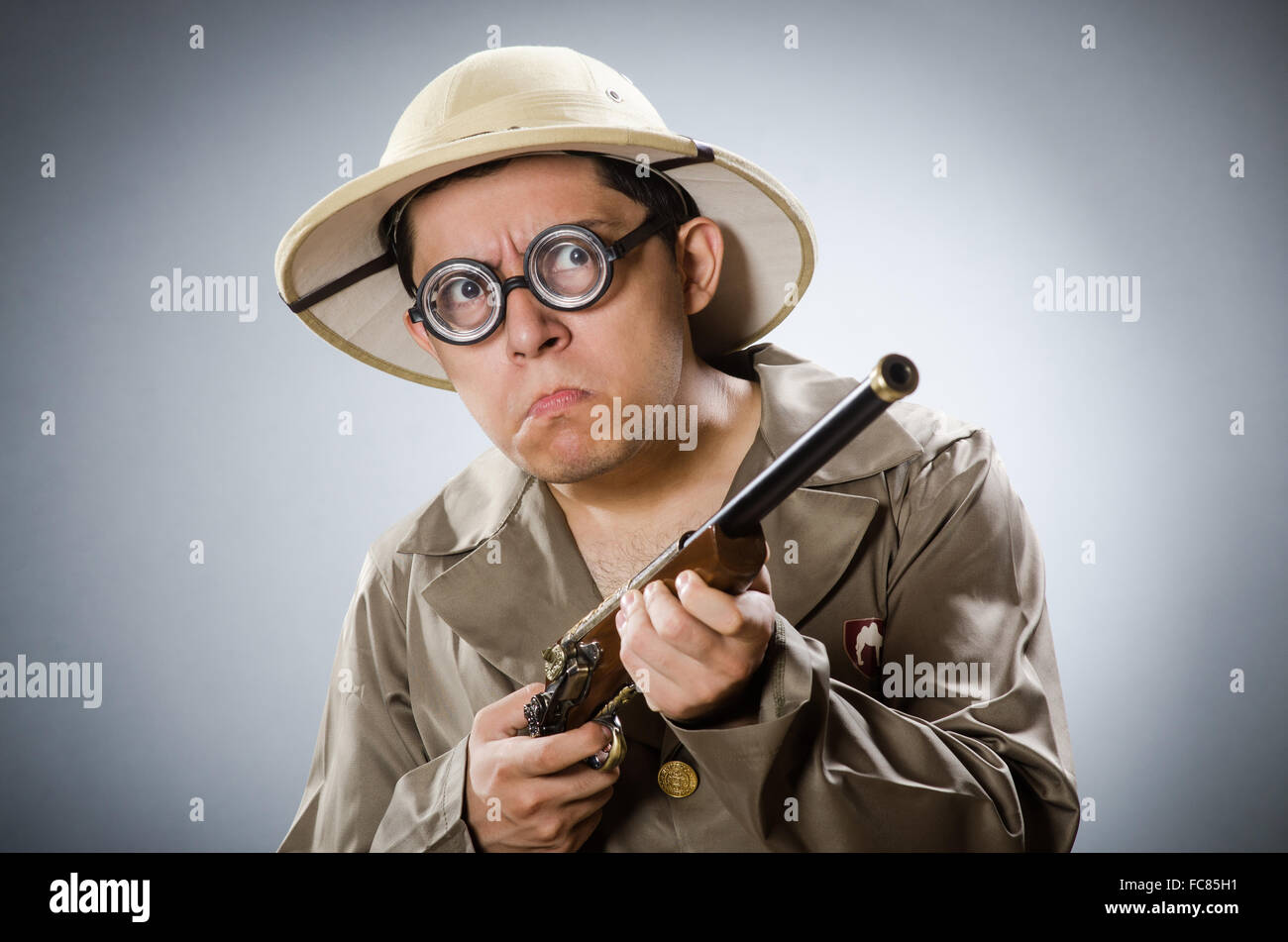 Funny hunter in hunting concept Stock Photo - Alamy