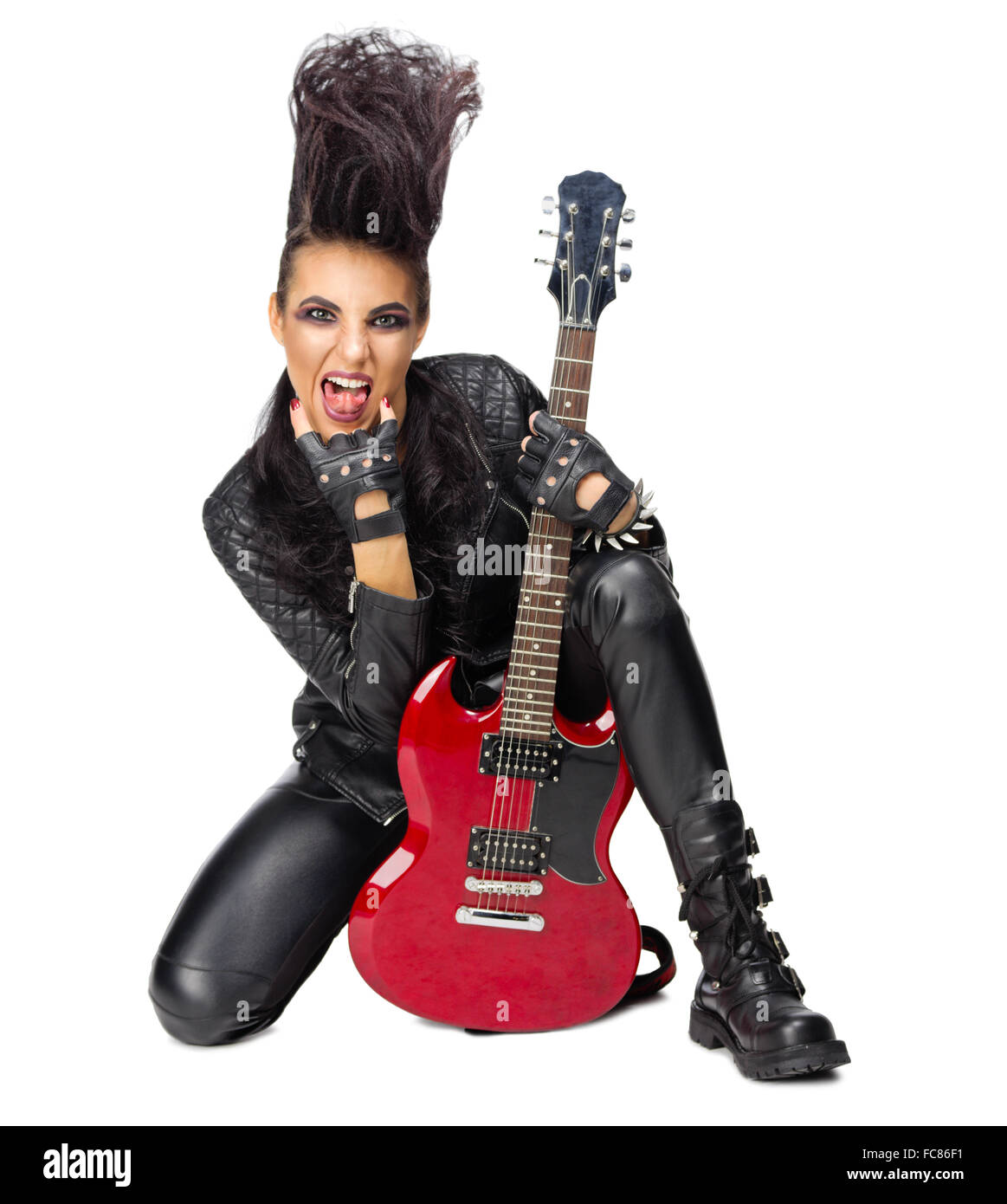 Rock musician in leather clothing isolated Stock Photo - Alamy