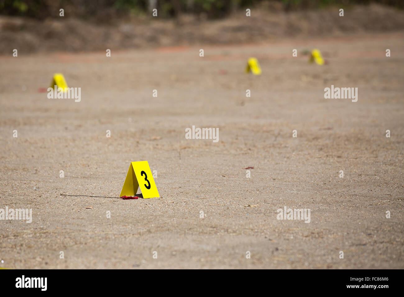 yellow evidence number tag in car bomb crime scene Stock Photo - Alamy