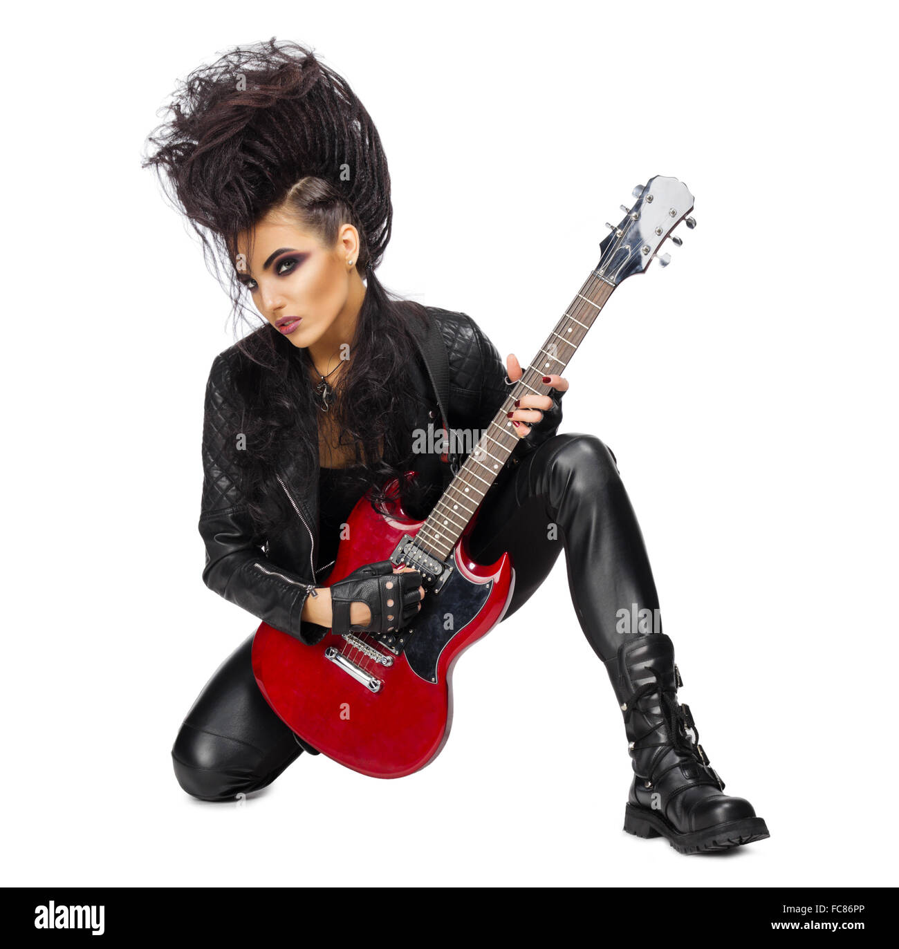 Rock musician in leather clothing isolated Stock Photo - Alamy