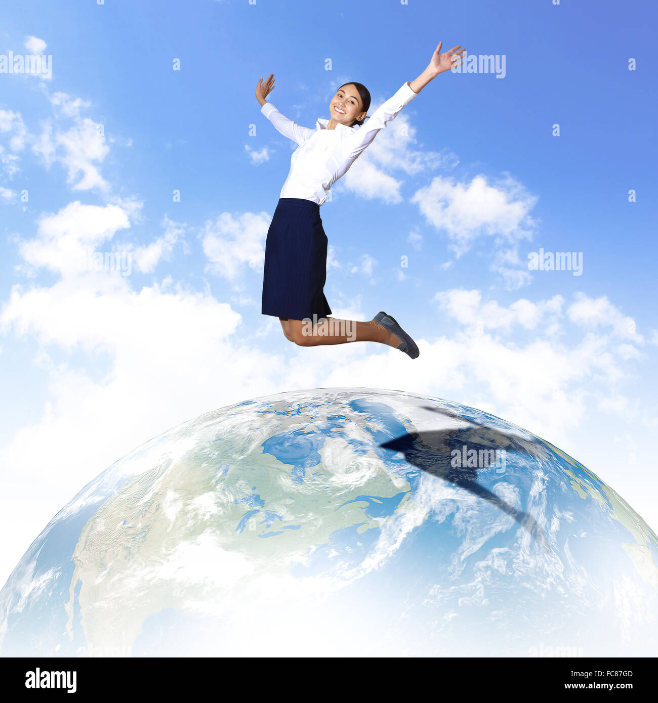 Young woman jumping up with our planet earth below Stock Photo - Alamy