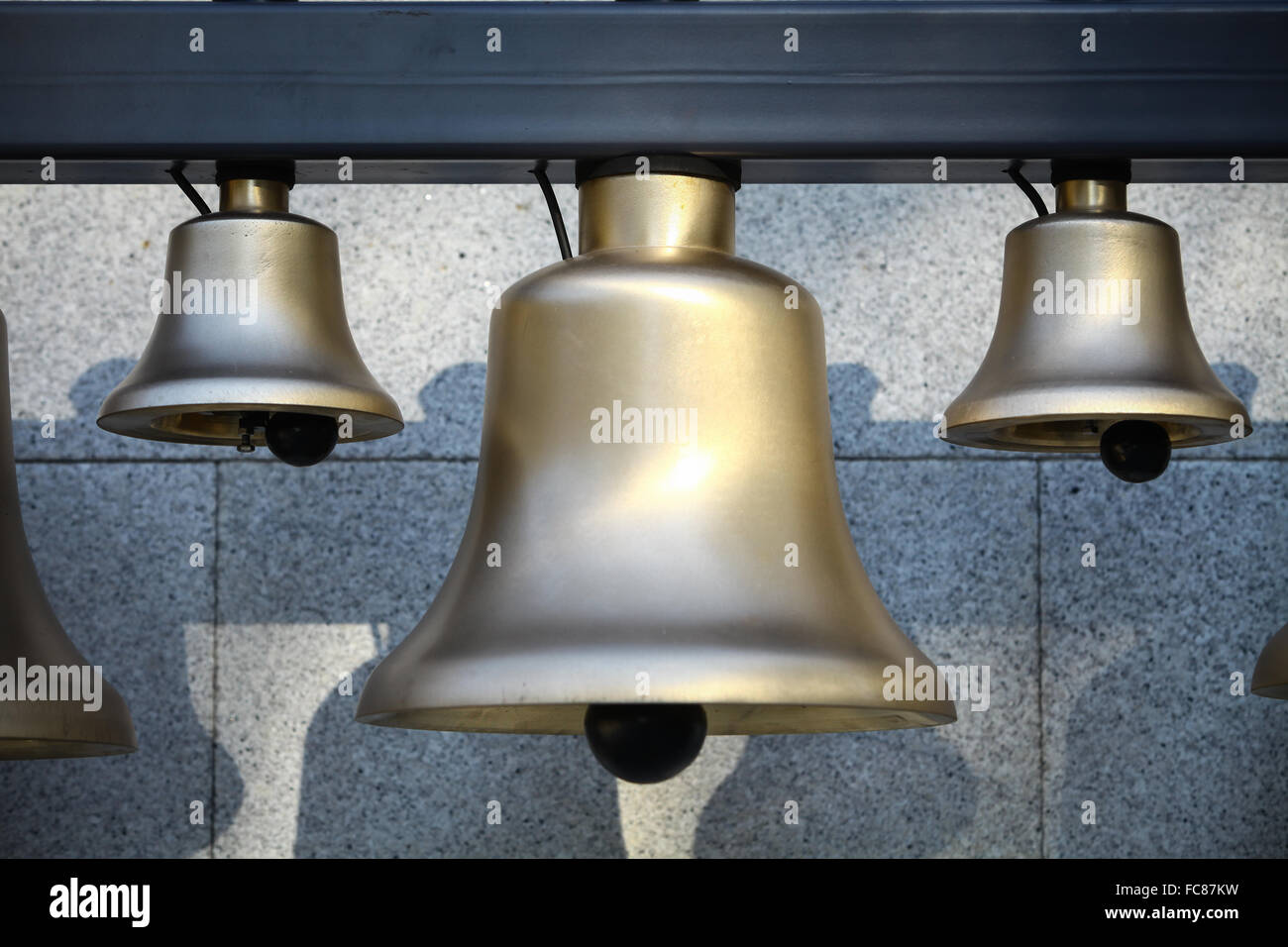 Color image of some various sized bells in a row Stock Photo - Alamy