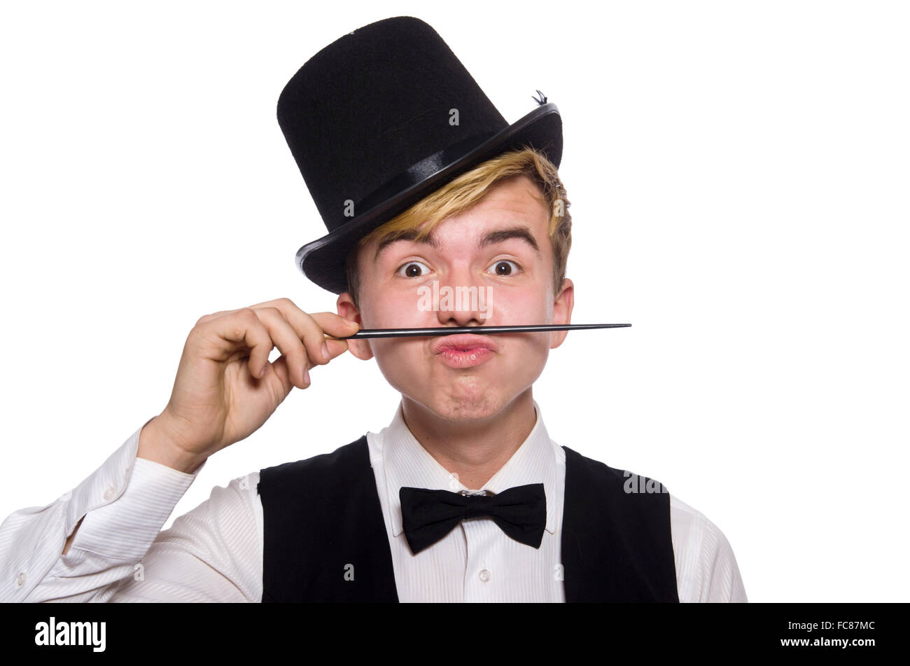 Magician with magic stick isolated on white Stock Photo - Alamy