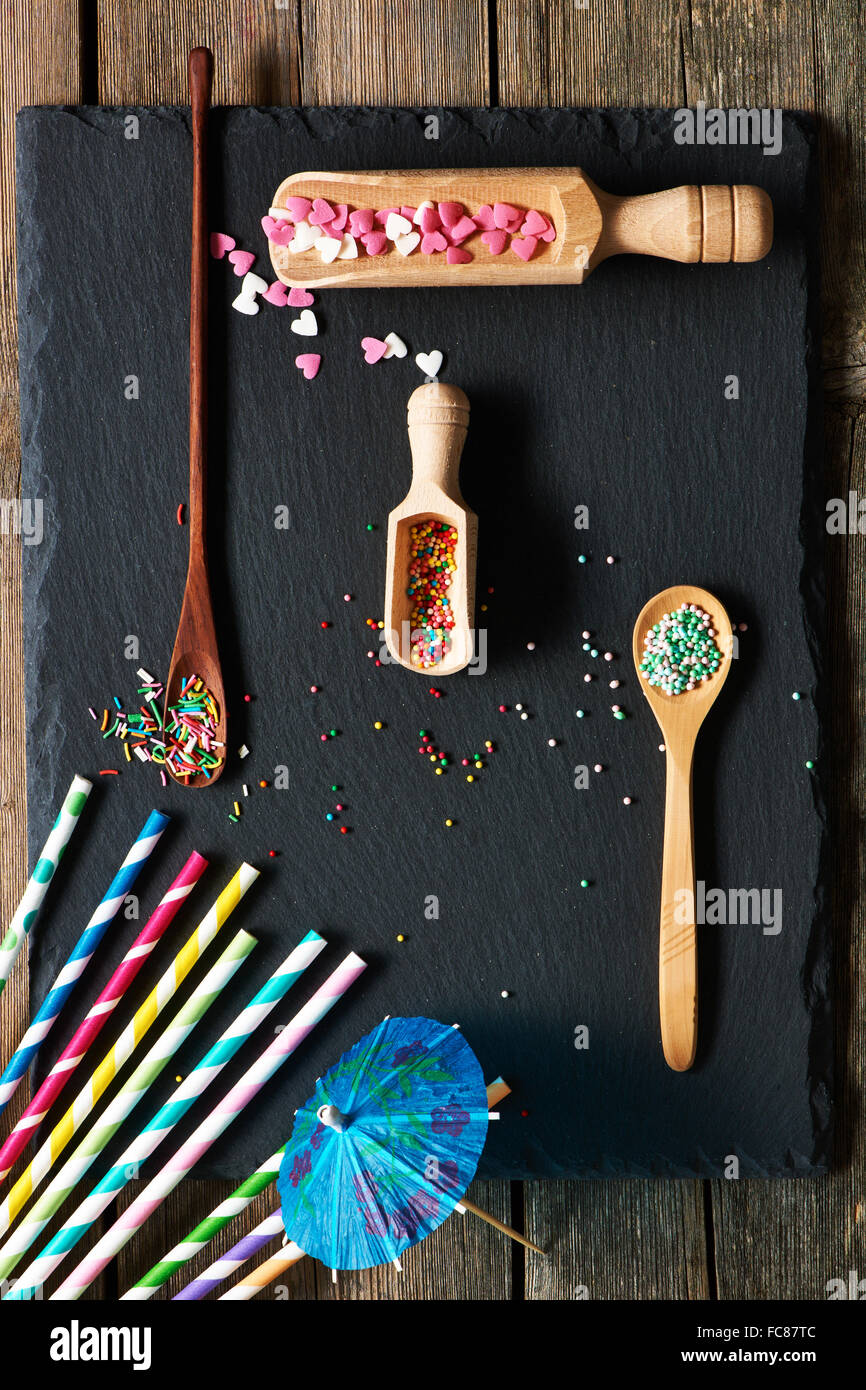 Drinking straws and sugar sprinkle dots Stock Photo - Alamy