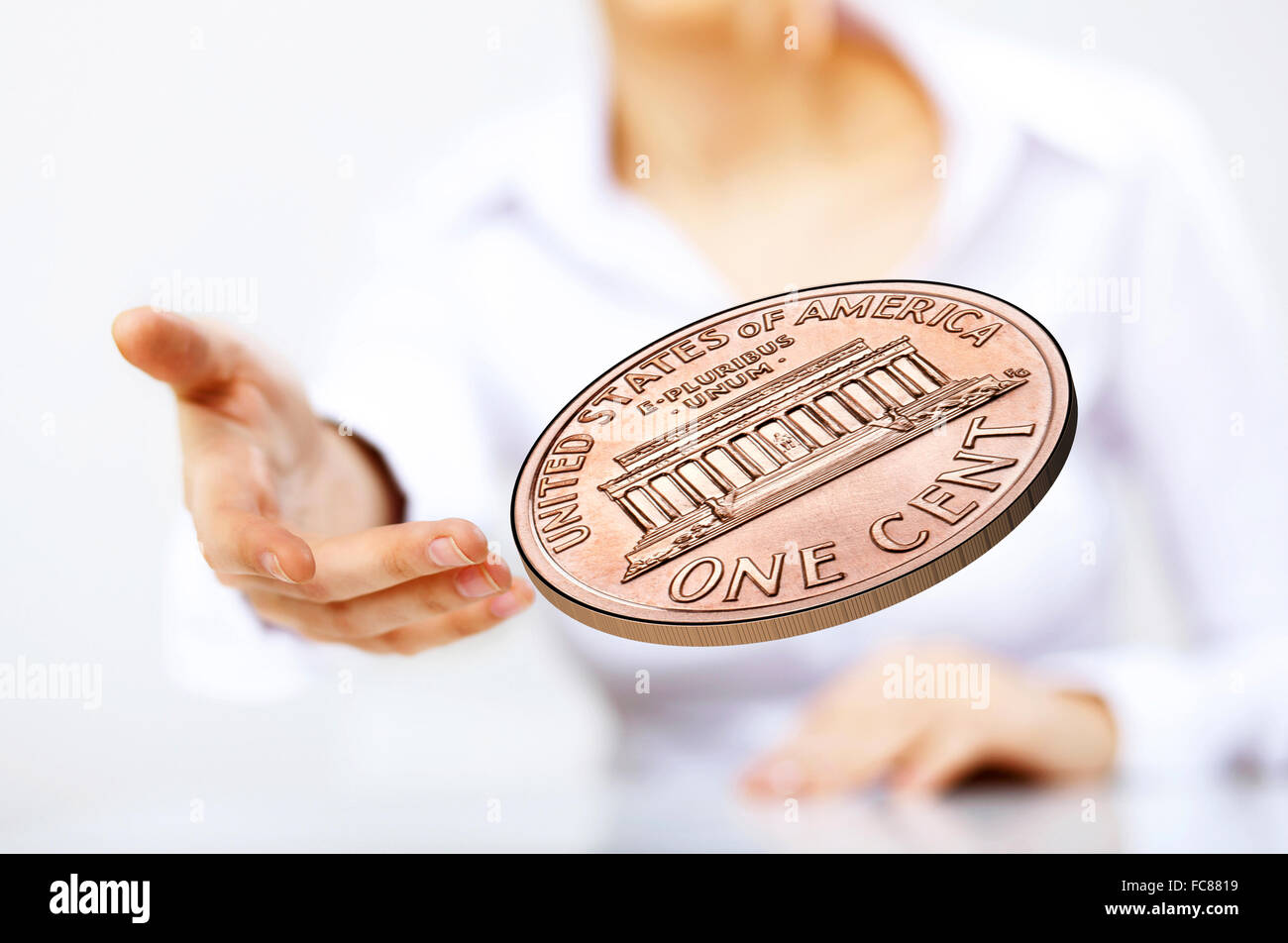 Person throwing a coin as symbol of risk and luck Stock Photo - Alamy