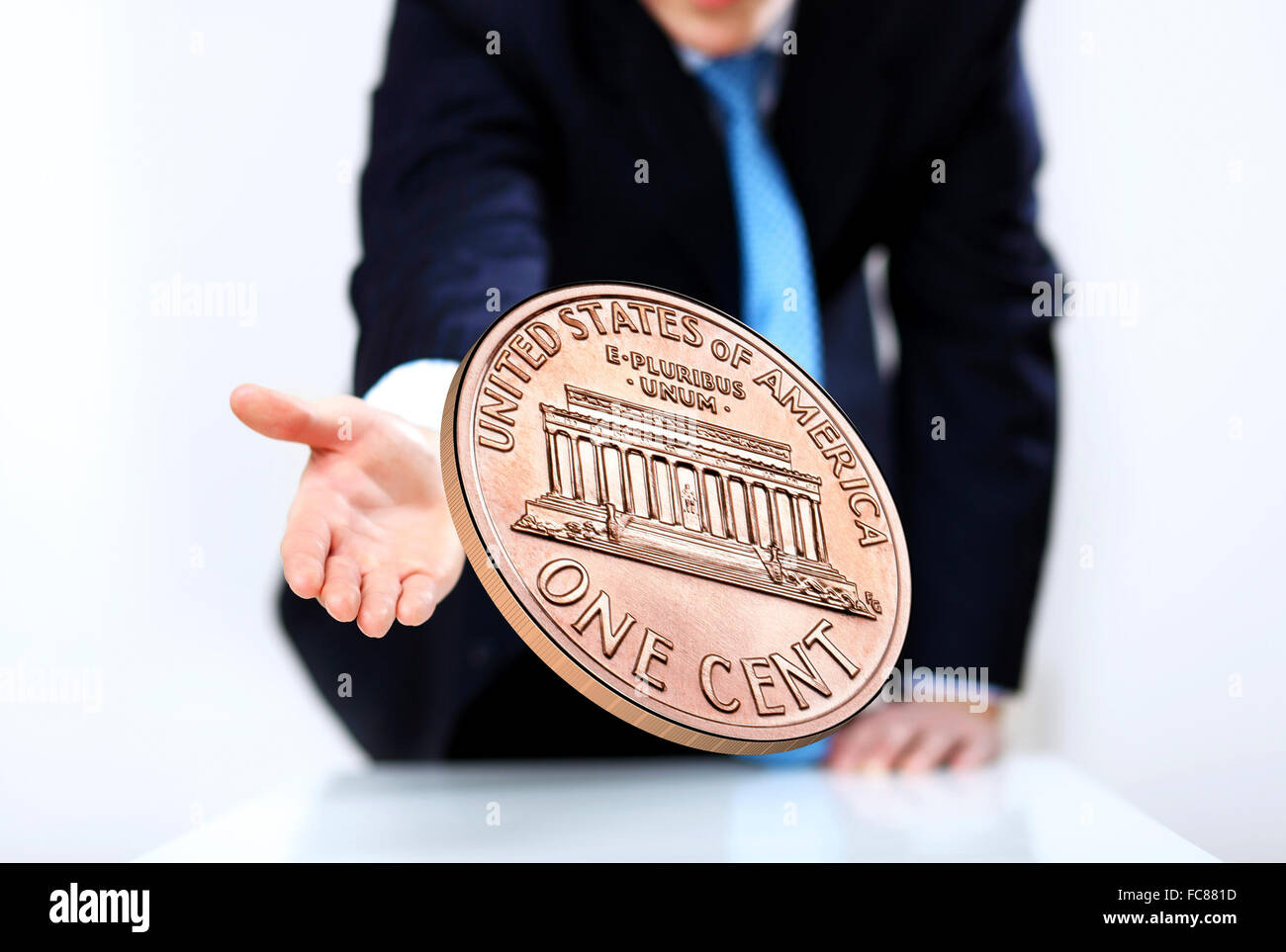 Person throwing a coin as symbol of risk and luck Stock Photo - Alamy