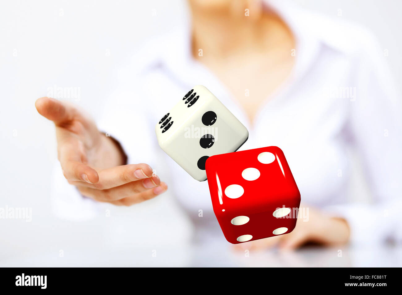 Image of a flying dice as symbol of risk and luck Stock Photo - Alamy