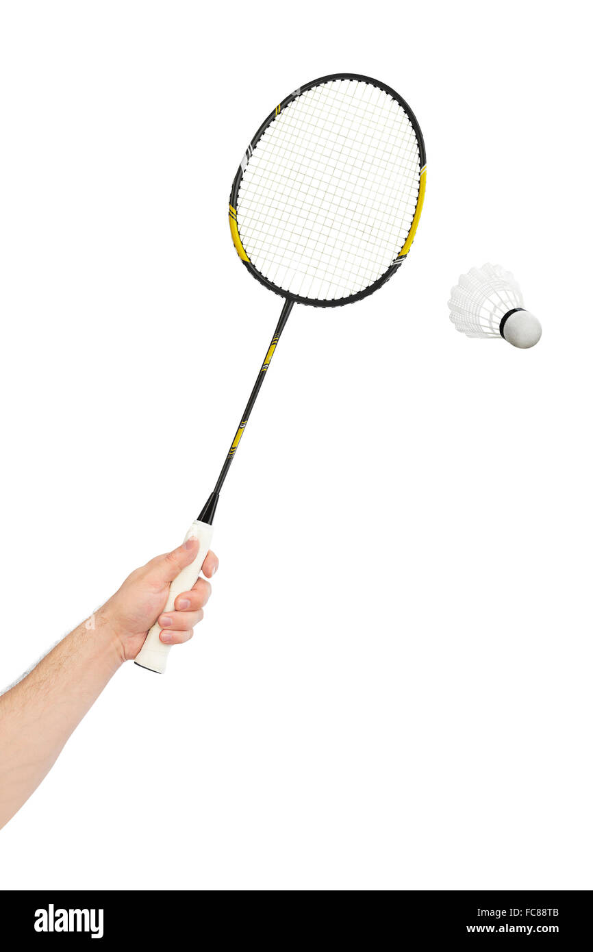 Hand with badminton racket and shuttlecock Stock Photo - Alamy