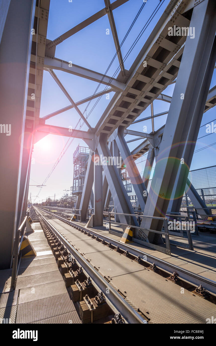 Modern railway steel bridge over highway Stock Photo - Alamy