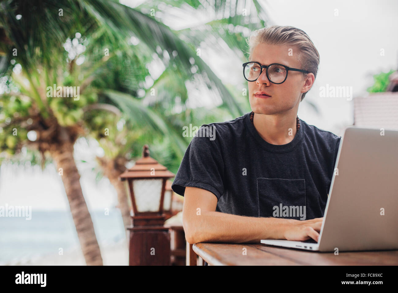 Caucasian tourist man typing hi-res stock photography and images - Alamy