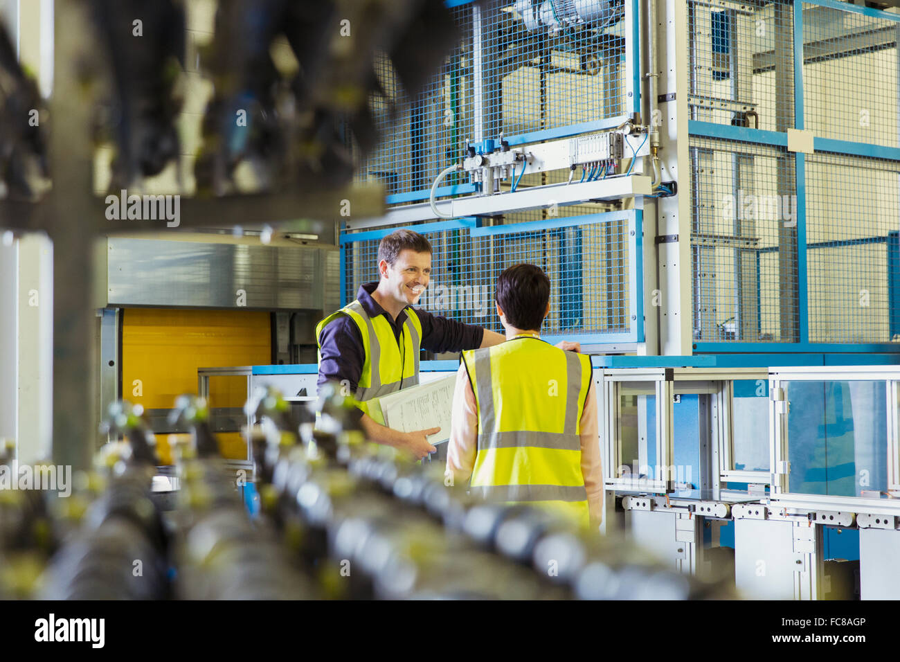 Talking production people on hi-res stock photography and images - Alamy