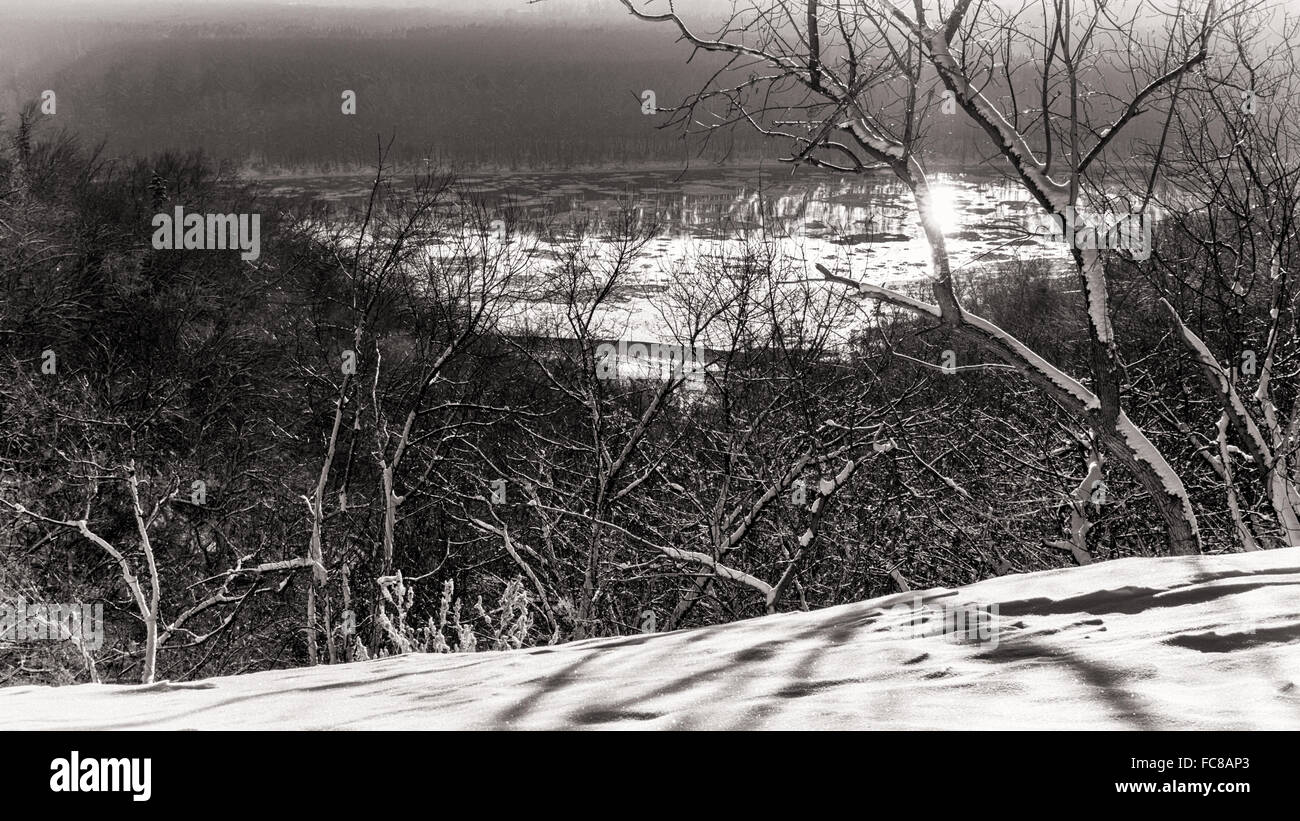 Sunlight reflects off of the White River in Ufa Russia illuminating the ...