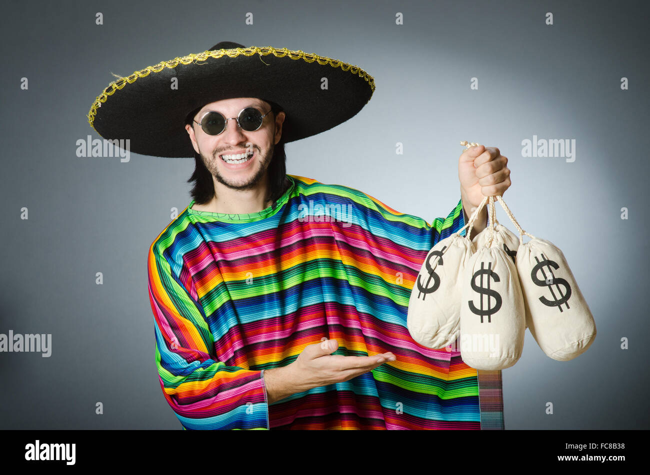 Mexican man with money sacks Stock Photo - Alamy