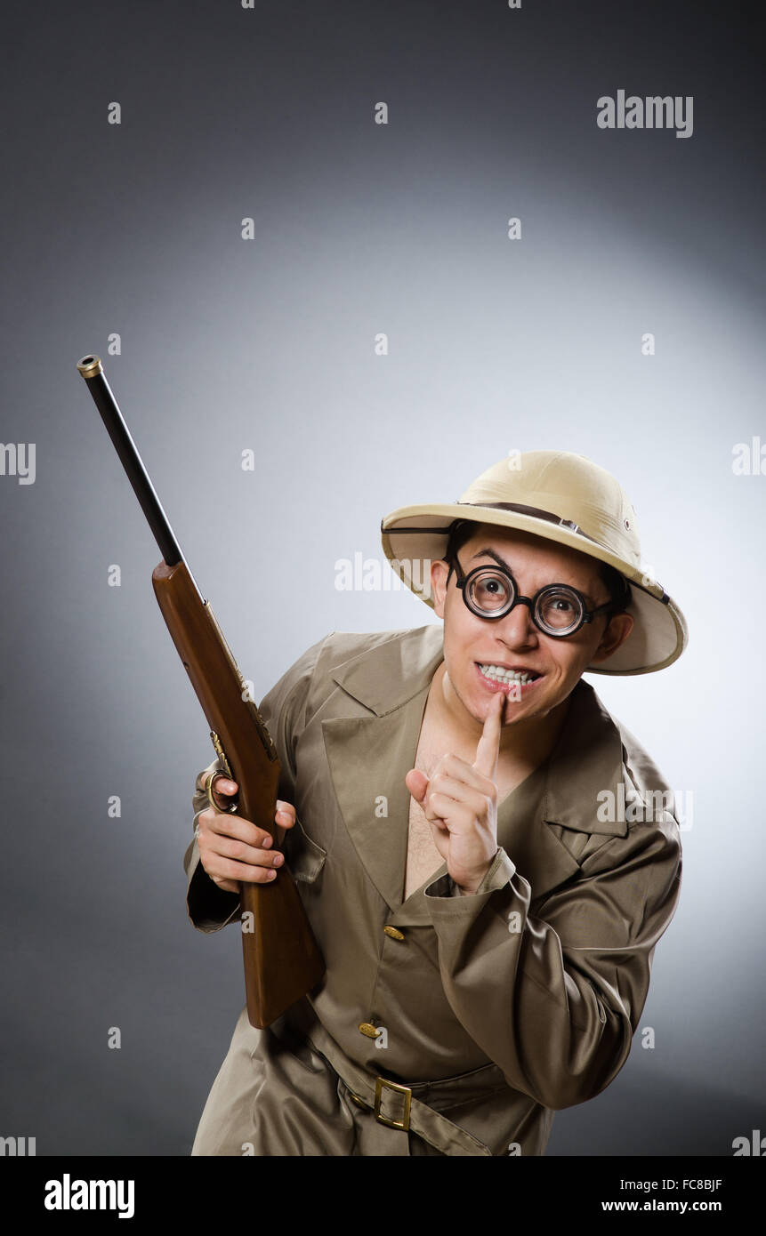 Funny hunter in hunting concept Stock Photo - Alamy