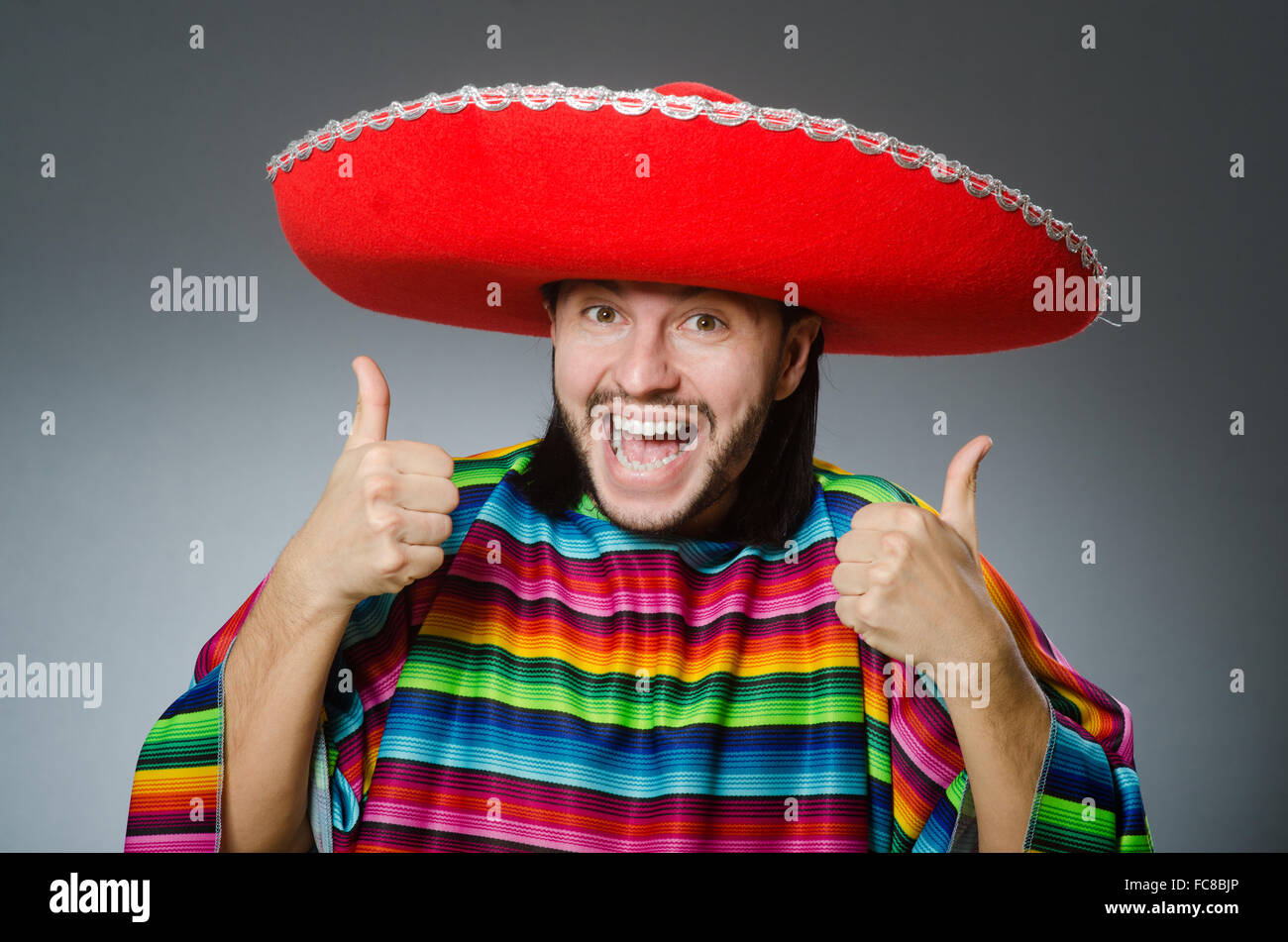 Mexican man with thumbs up Stock Photo - Alamy